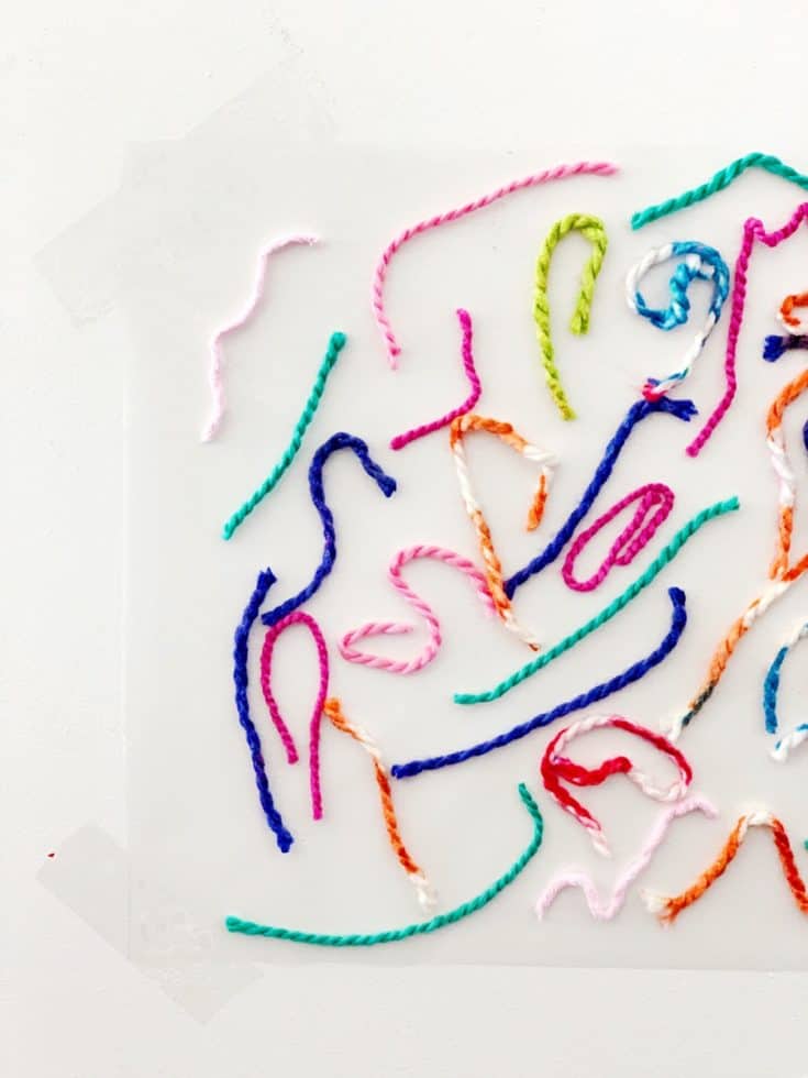 STICKY WALL YARN SENSORY ACTIVITY FOR BABIES AND TODDLERS - hello ...