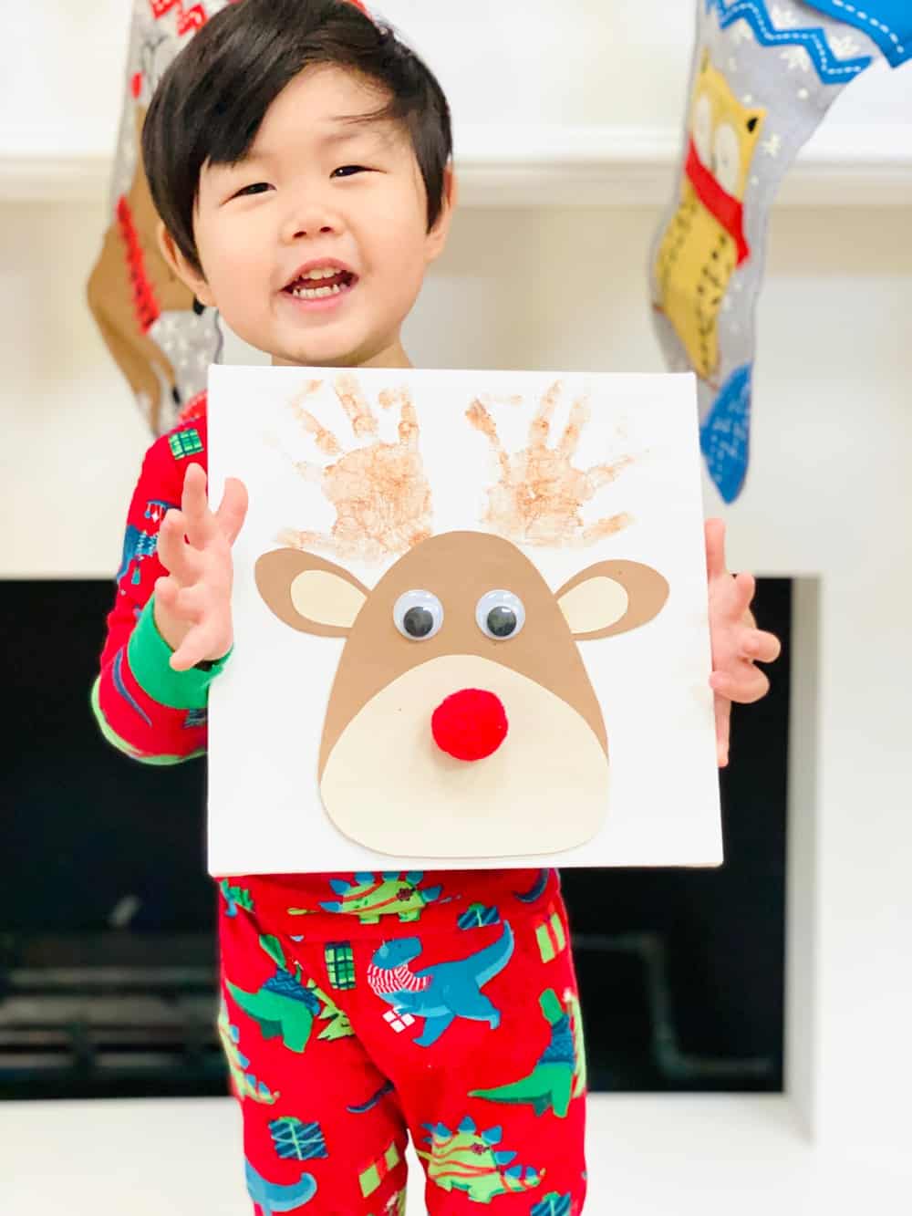 Rudolph Reindeer Handprint Art - Cute Christmas Handprint art for Kids