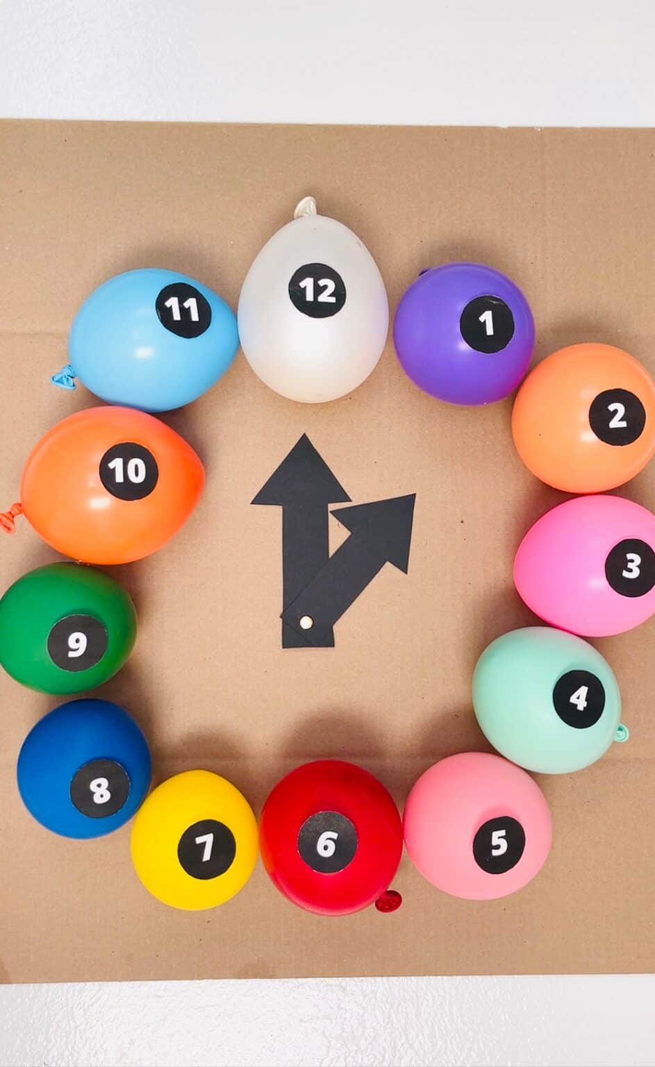 Giant Cardboard Ball Maze - Fun recycled STEM project for kids