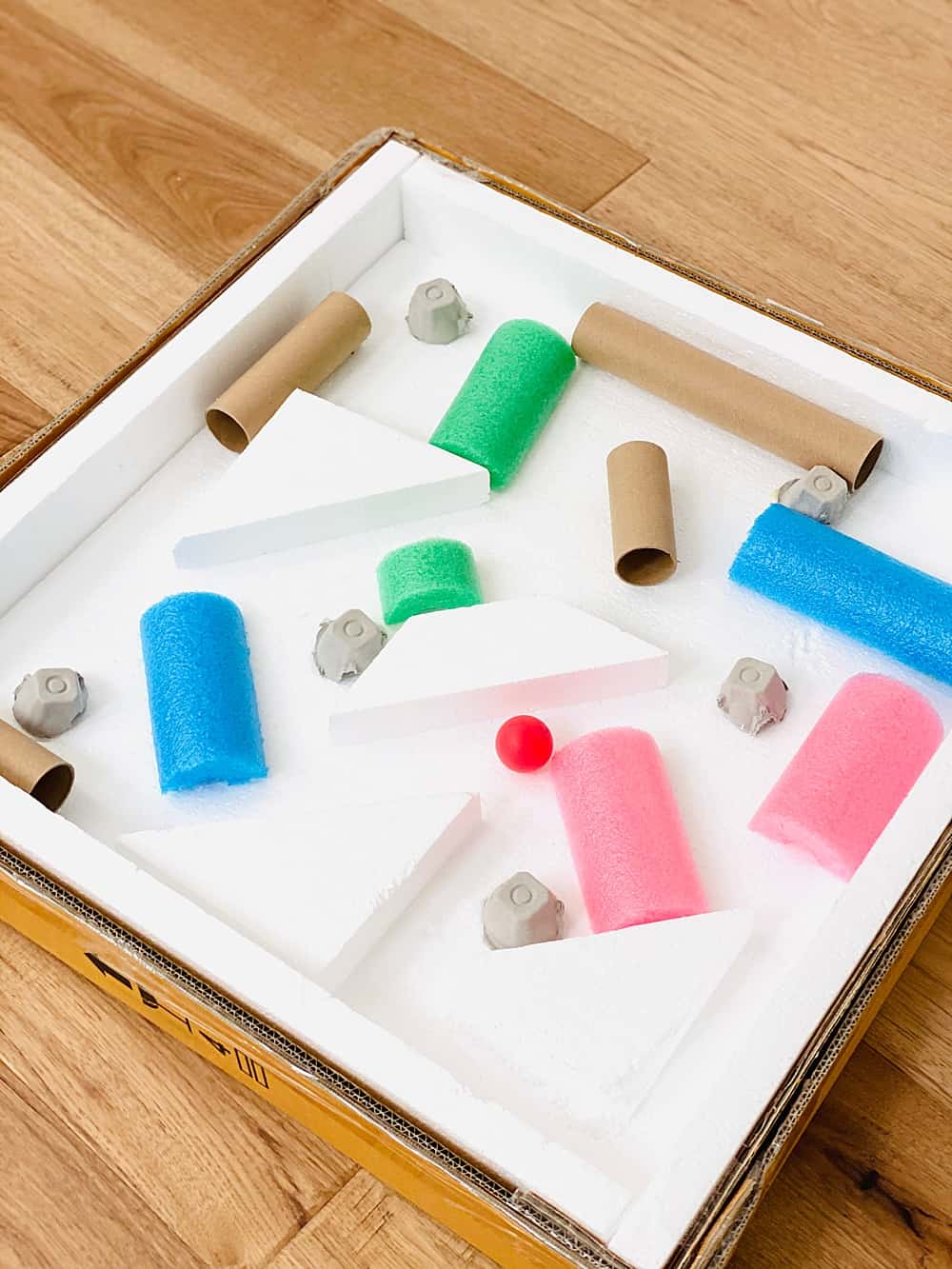 Giant Cardboard Ball Maze - Fun recycled STEM project for kids