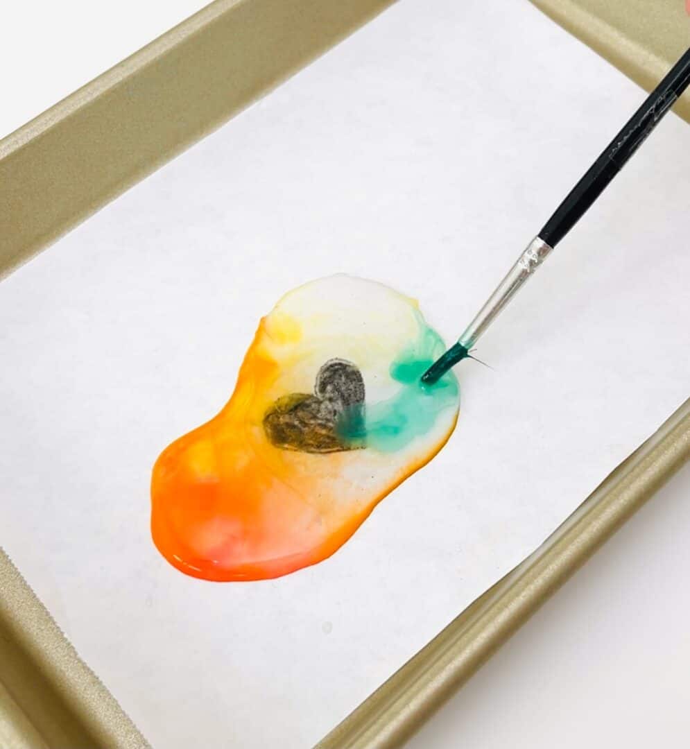 Rainbow Water Experiment - Try this colorful rainbow art project for kids!