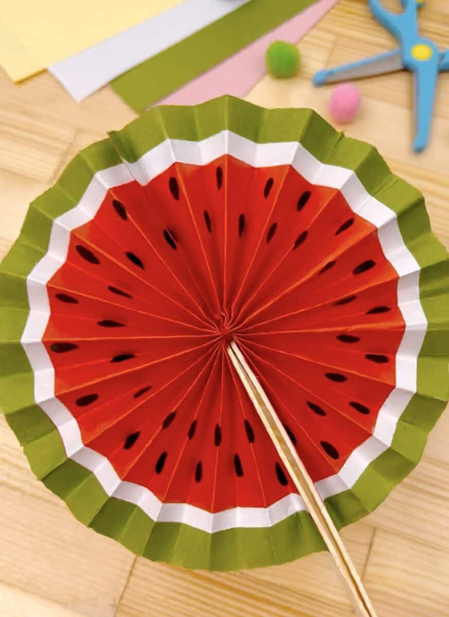 This DIY Watermelon Paper Fan is the Cutest Summer Craft